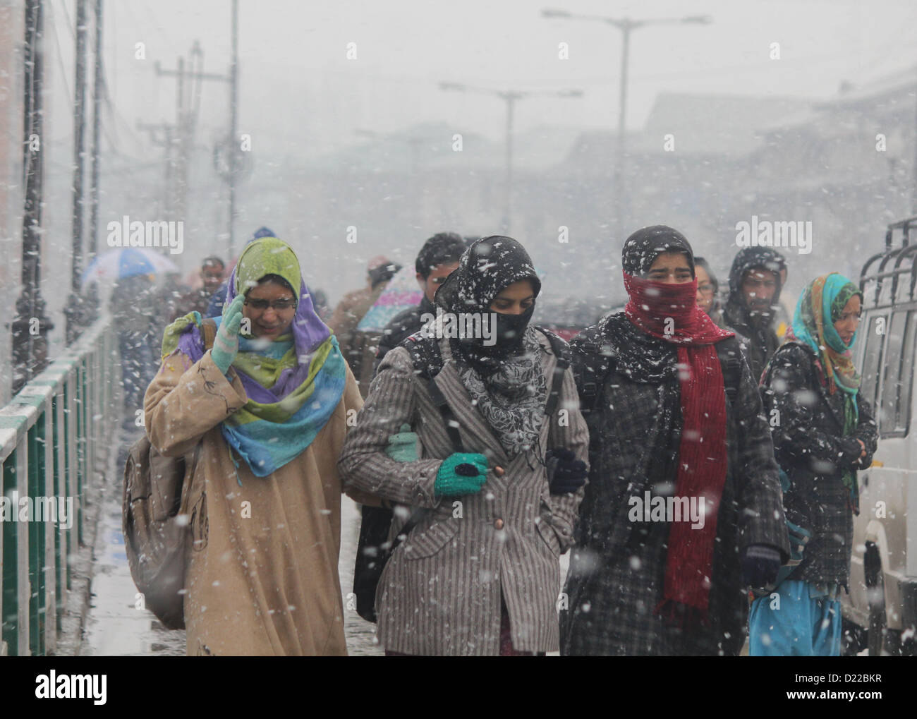 Kashmiri muslim walks in snow hi-res stock photography and images - Alamy