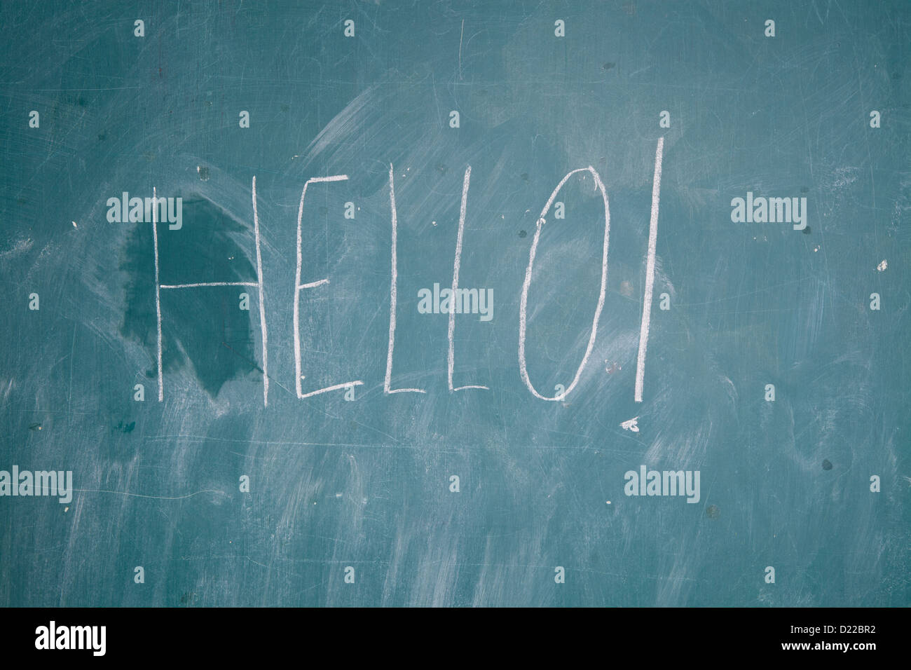 The word hello with exclamation mark handwritten on chalkboard with ...