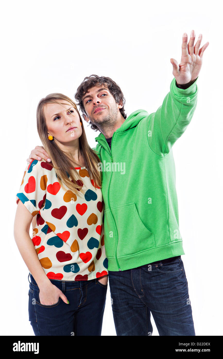 Woman looking man pointing Cut Out Stock Images & Pictures - Alamy