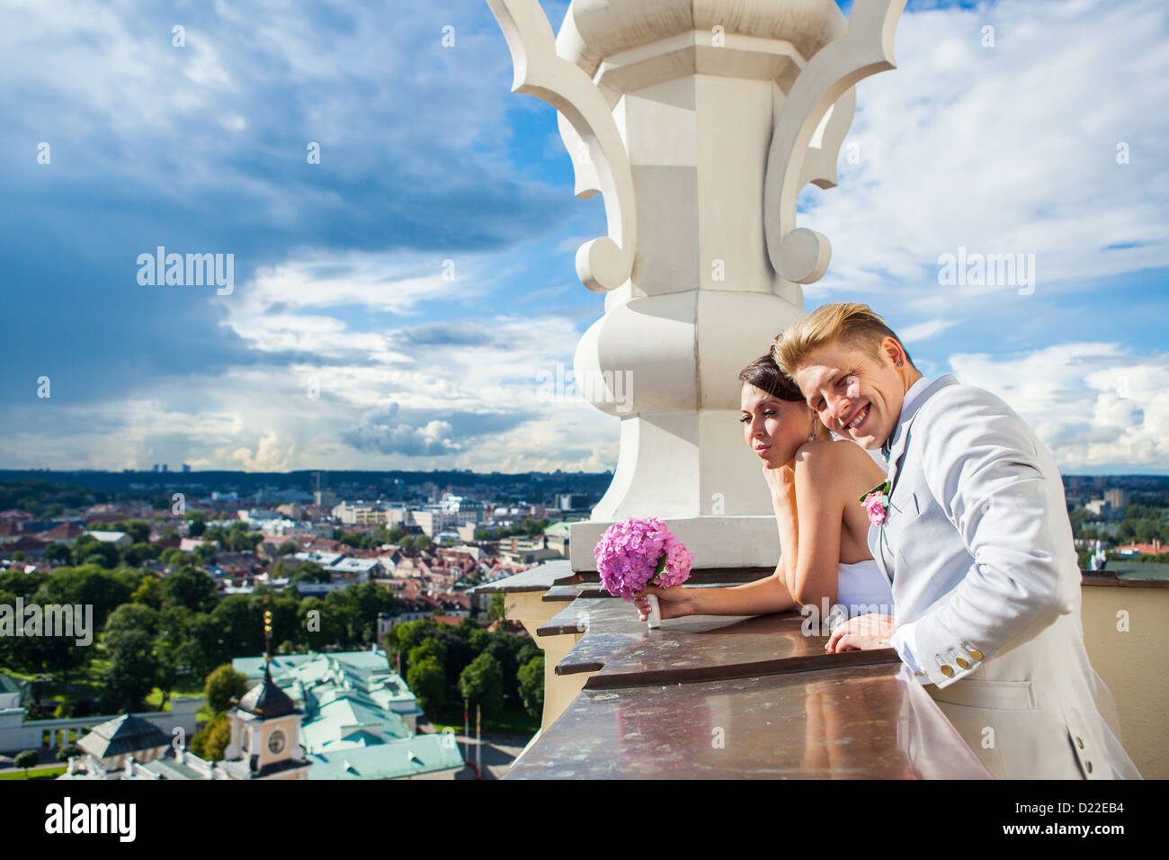 Young couple on their wedding day enjoying panoramic view Stock Photo ...