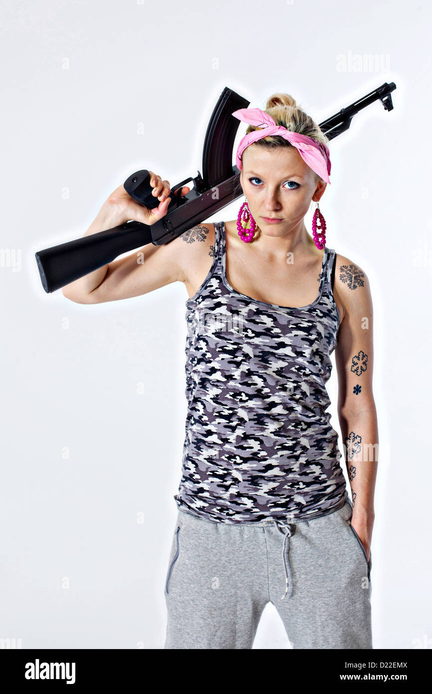 Woman holding riffle gun hi-res stock photography and images - Alamy