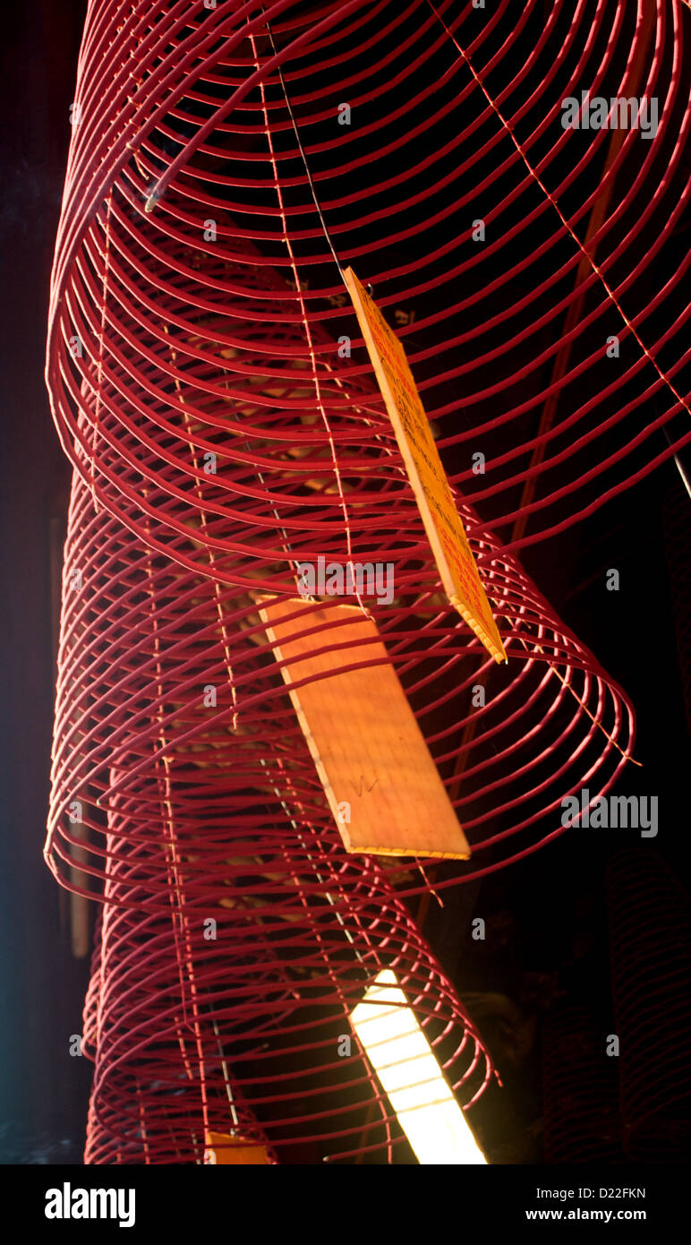 Large incense cones hang from the ceiling of the Phuc Kien Assembly ...