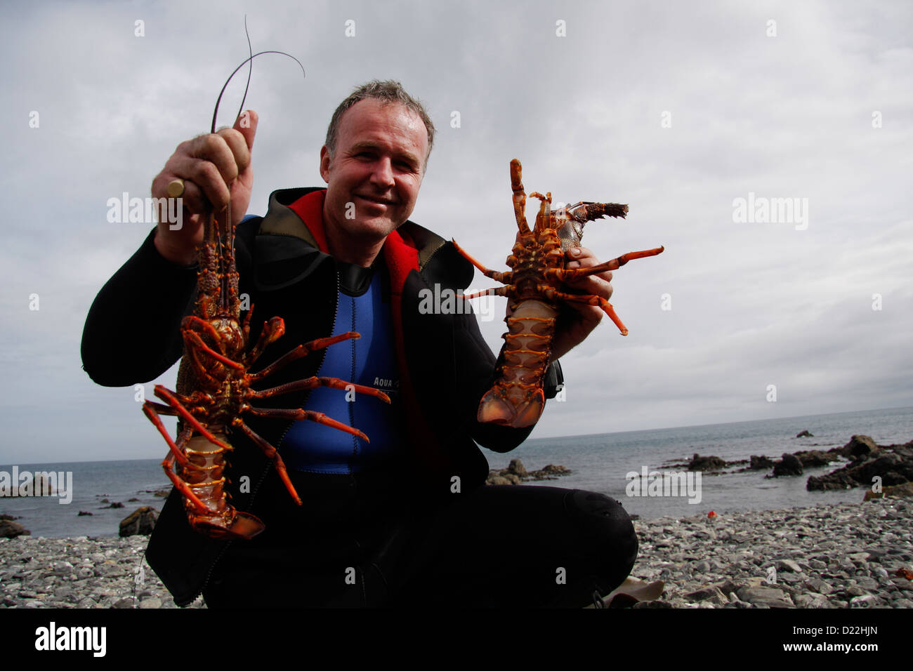 A crayfish hunter with his catch Stock Photo - Alamy