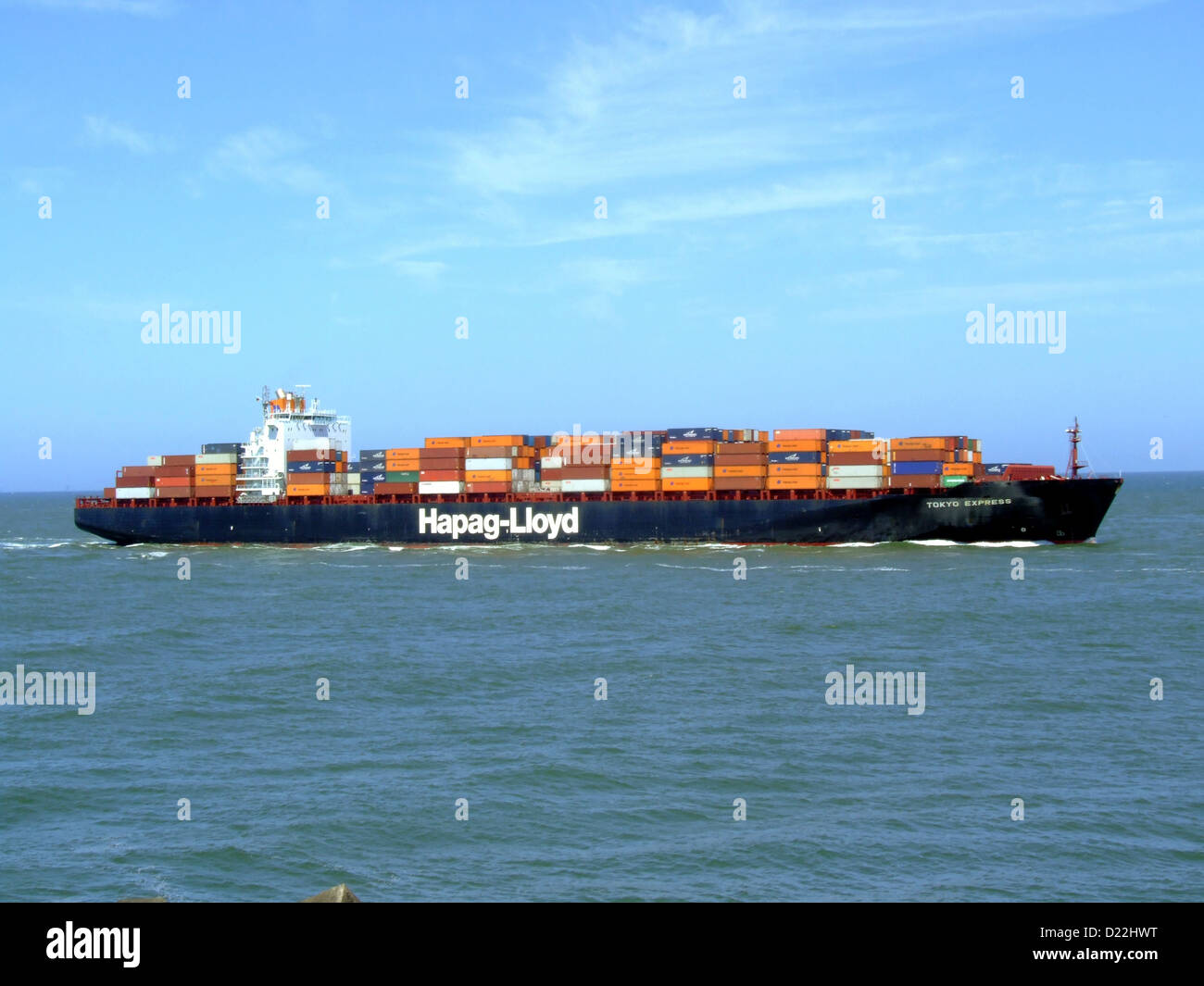 The Tokyo Express is a large container ship, designed for transporting ...