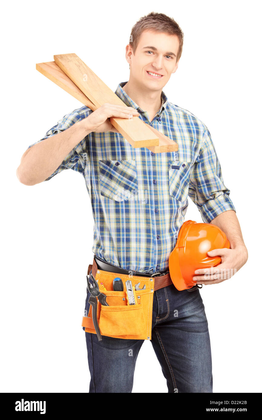 Smiling carpenter holding a helmet and sills isolated on white ...