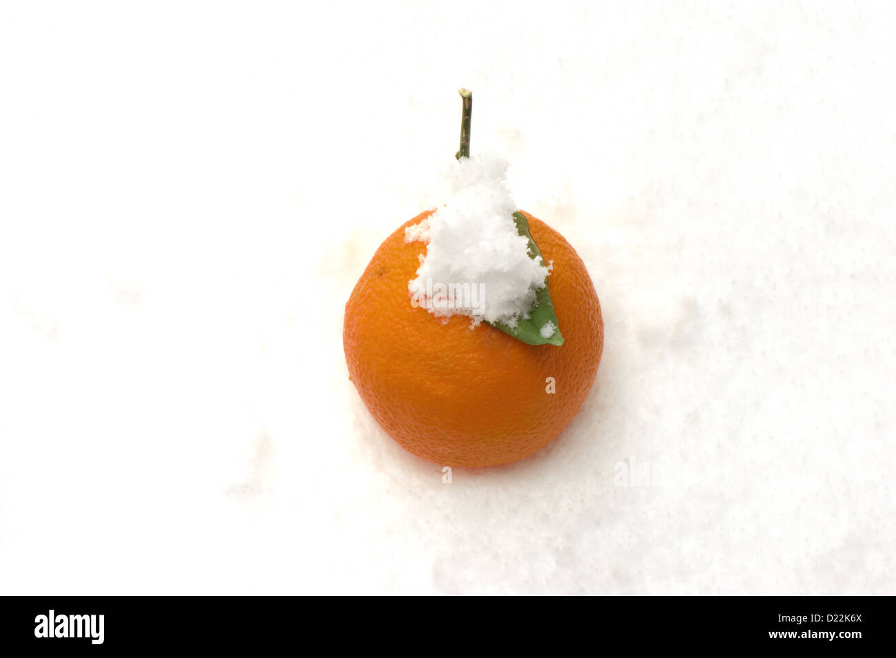 snow falling on an orange Stock Photo - Alamy