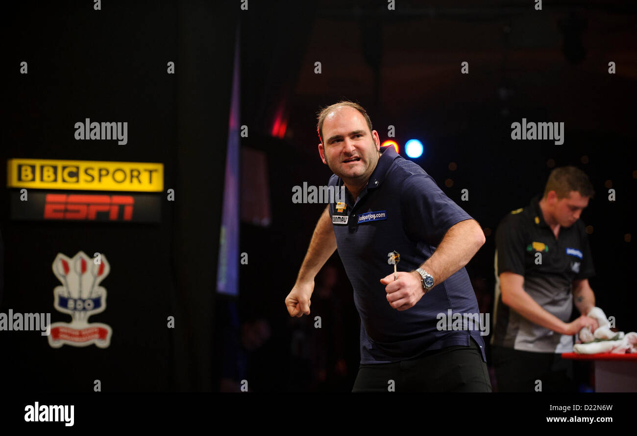 Frimley Green, UK. 12th January 2013. Scott Waites celebrates winning ...