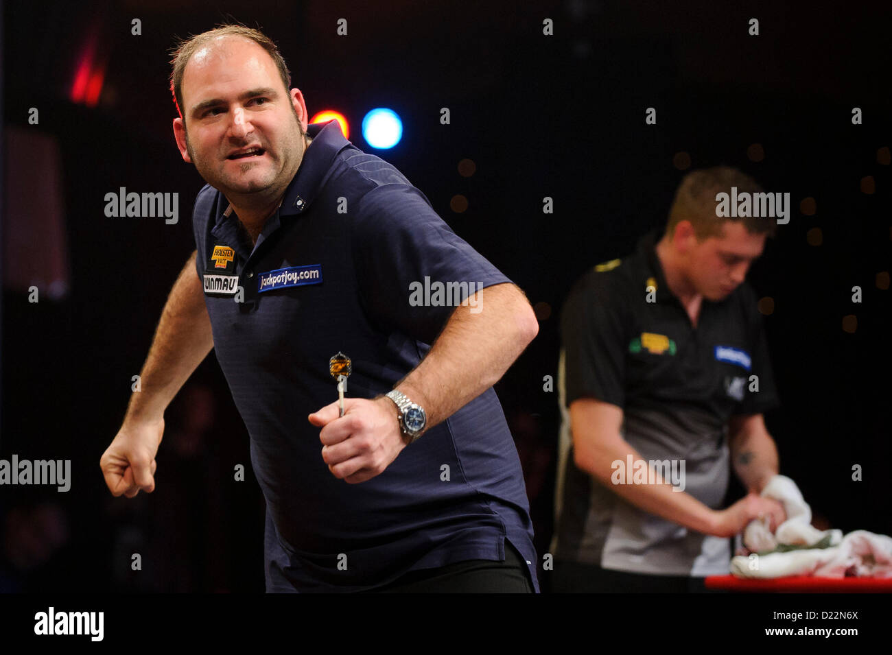 Frimley Green, UK. 12th January 2013. Scott Waites celebrates winning ...