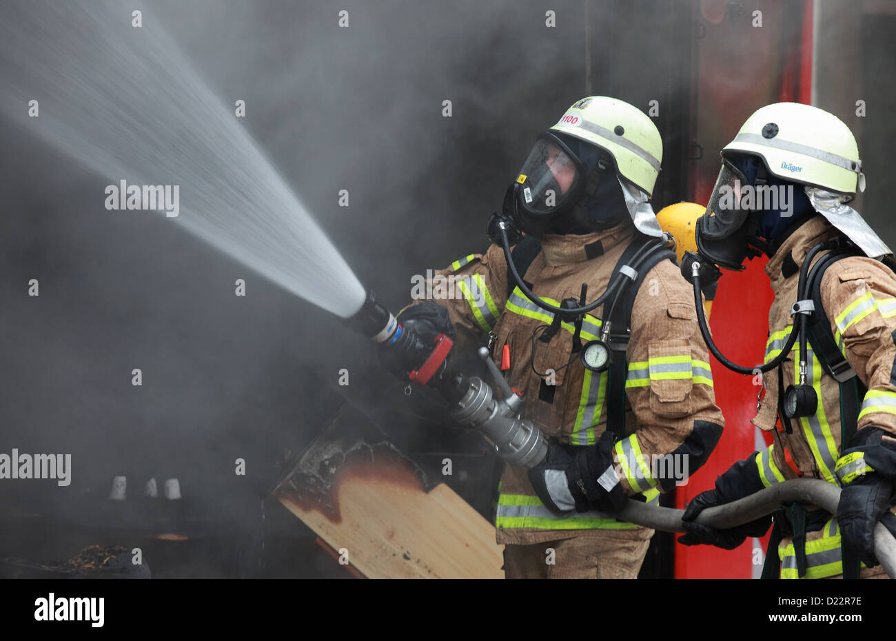 Berlin, Germany, firefighters work on extinguishing Stock Photo - Alamy