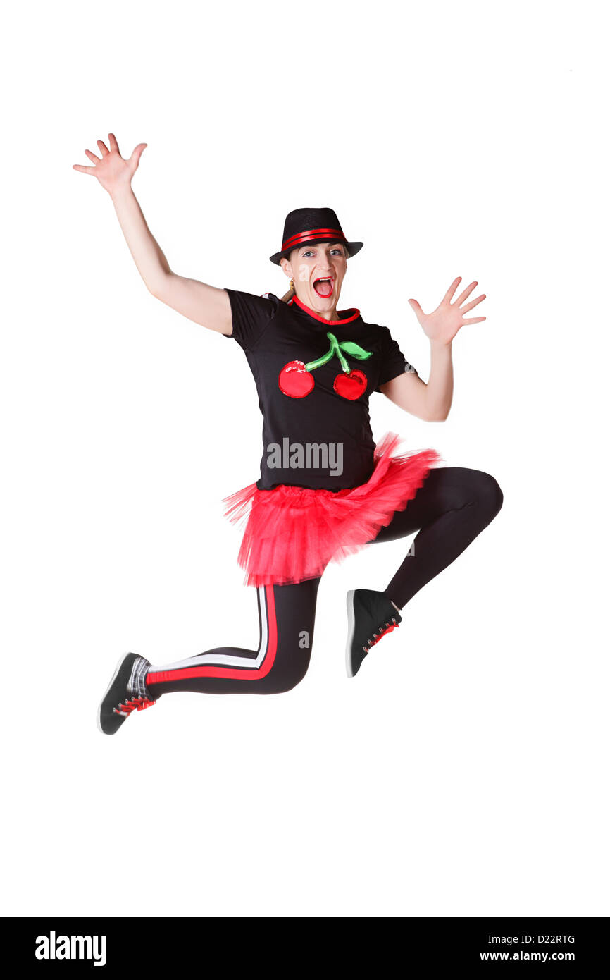 beautiful girln with hat jumping in studio Stock Photo - Alamy