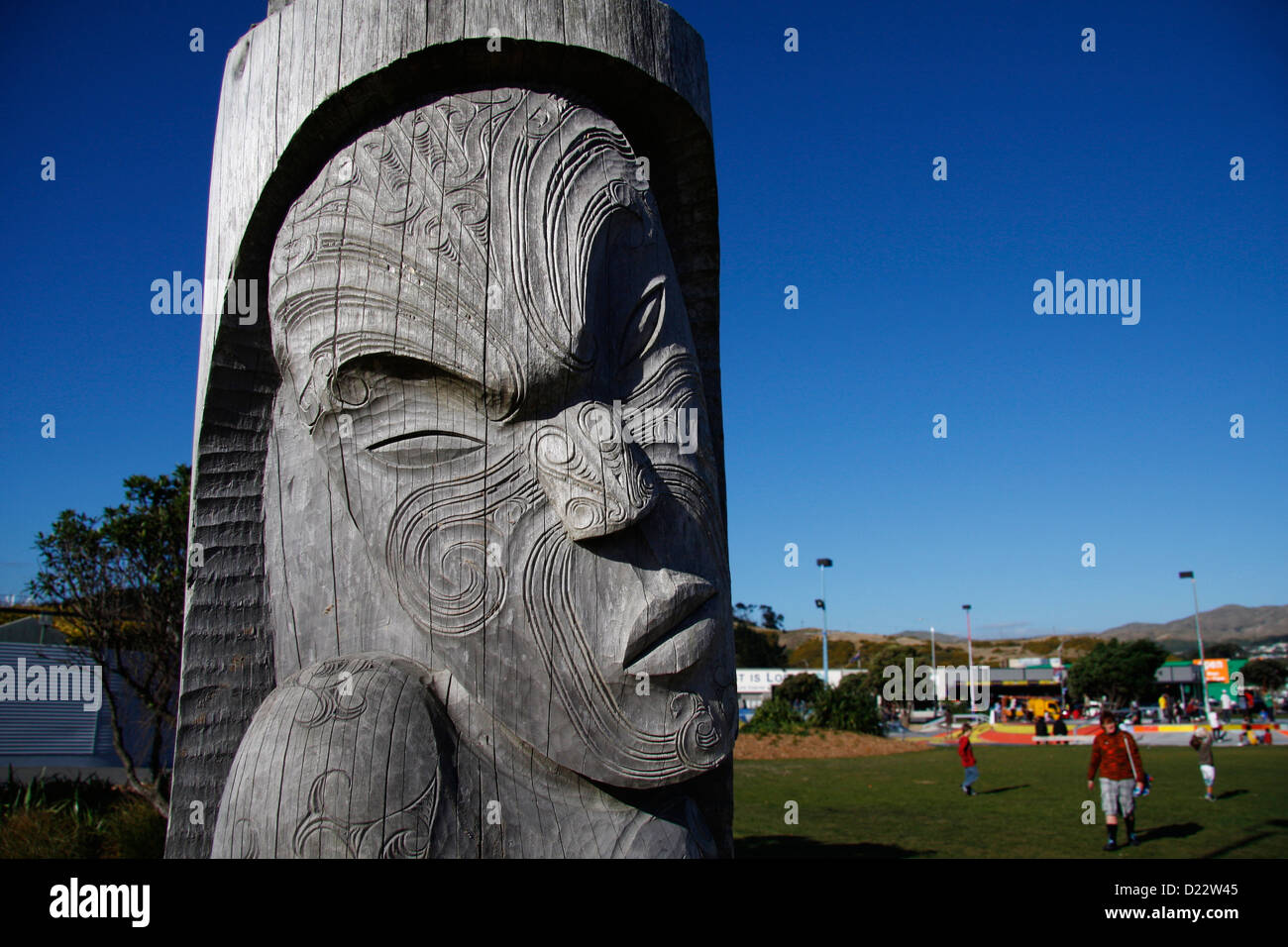 A wooden Maori statue in front of Te Rauparaha Arena, a community sport ...