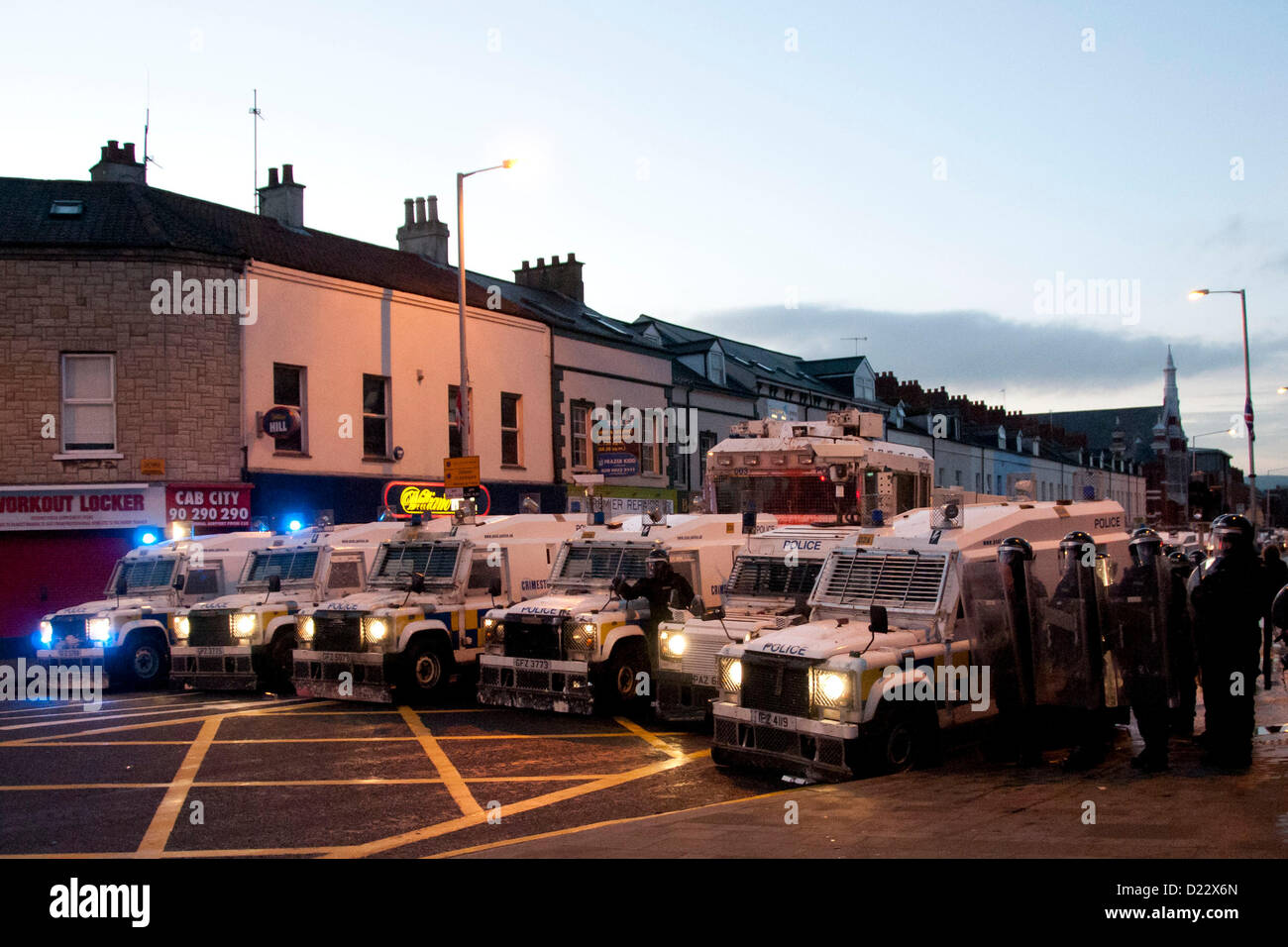 Belfast, UK. 12/01/13. Riot police before a charge as rioting breaks in ...
