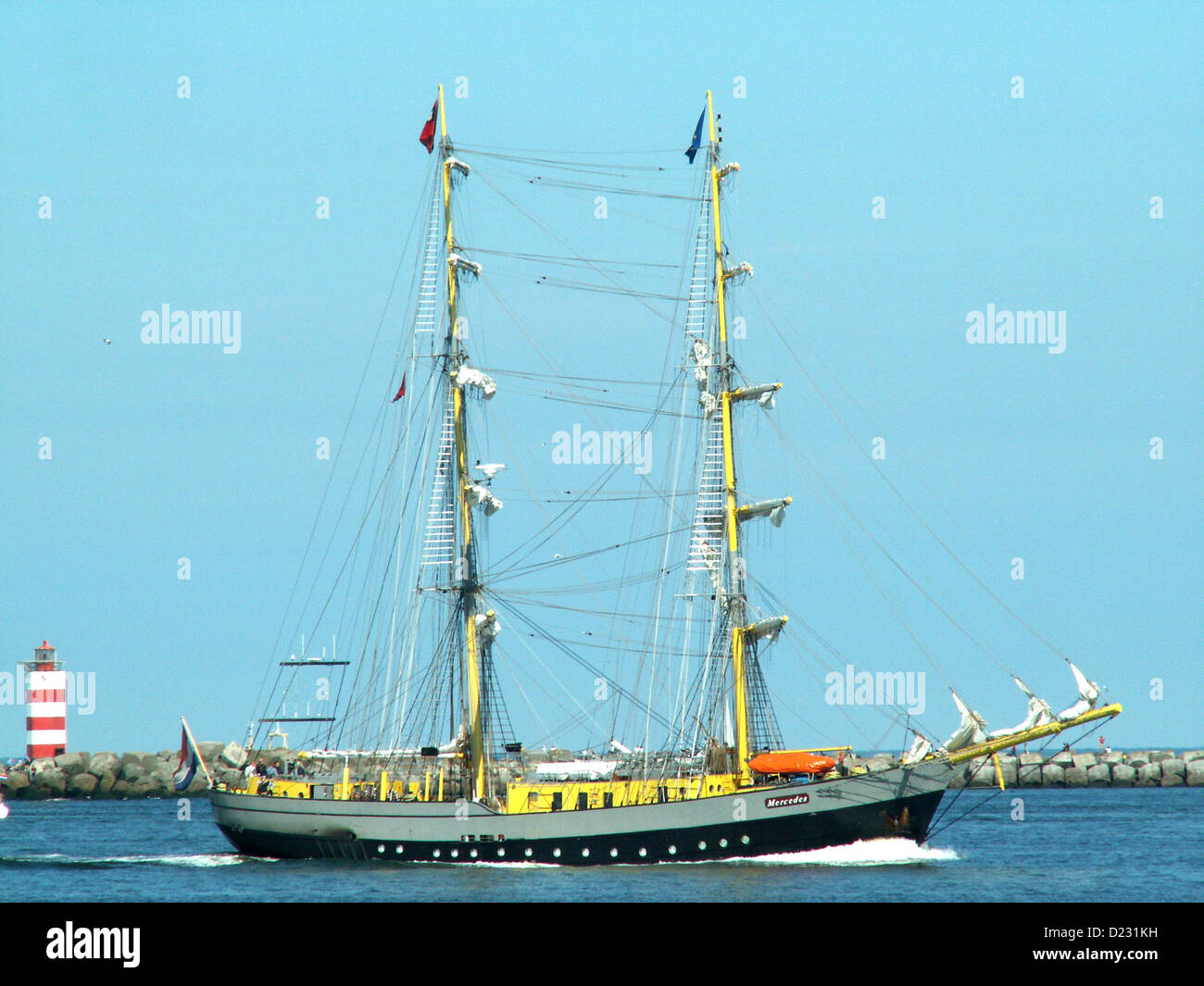 The classic Mercedes clipper sailboat features a blue hull, maritime ...