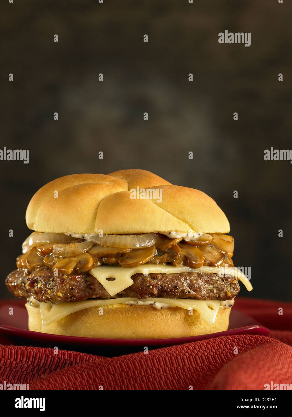 Mushroom swiss cheeseburger with grilled onions Stock Photo - Alamy