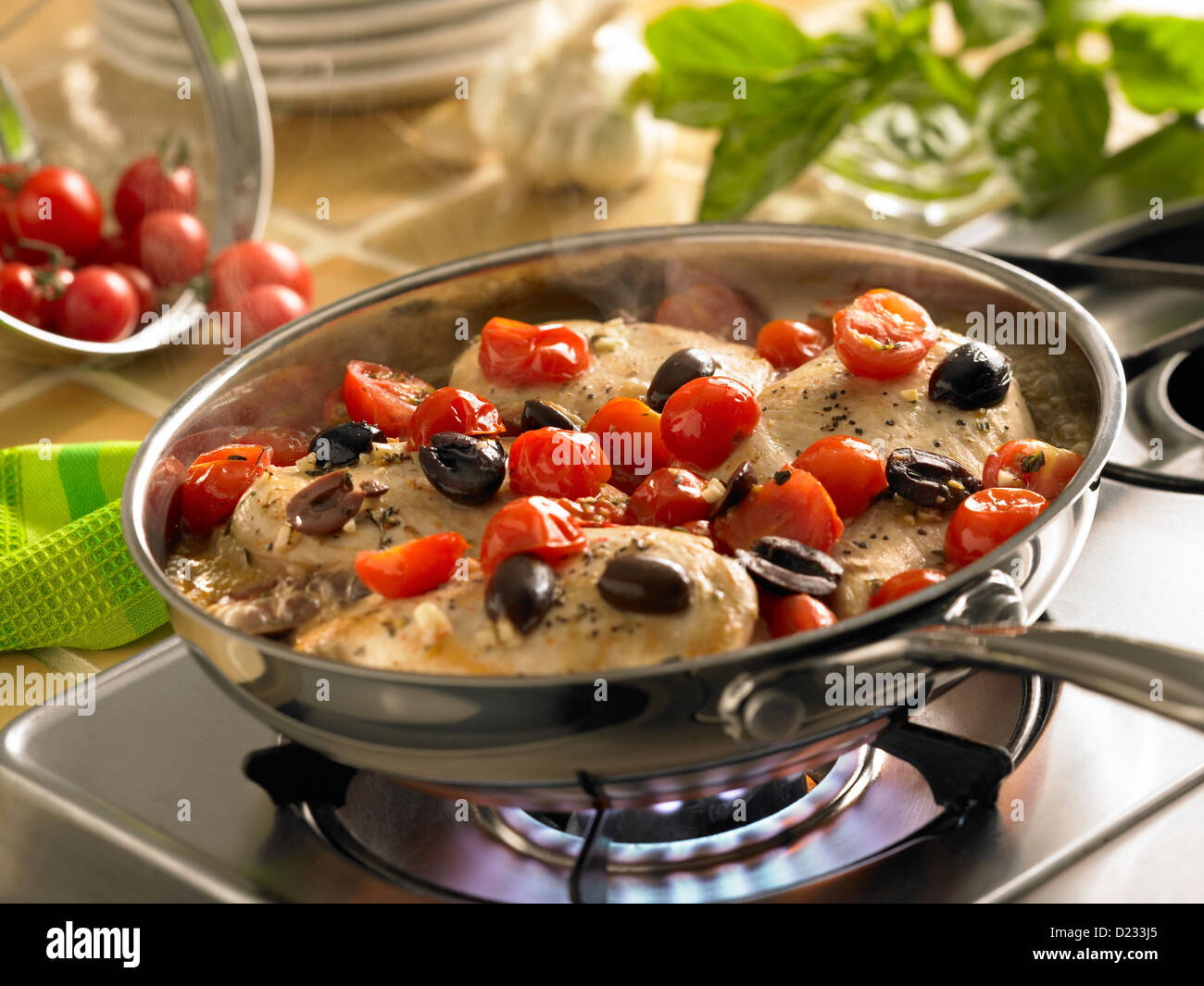 Chicken Provencal cooking on the stove Stock Photo - Alamy