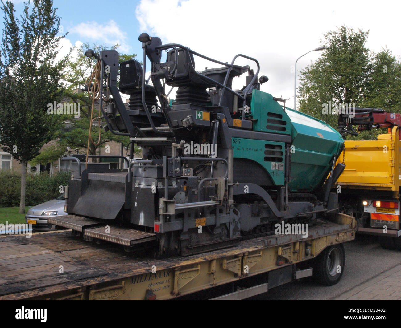 The Vogele Super 1300 is a modern road paver used in road construction ...