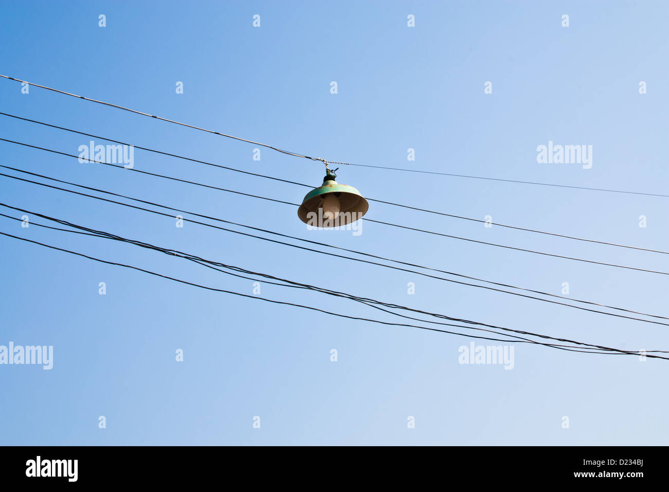 Lanterns on cables. Electrical cables and clutter Stock Photo - Alamy