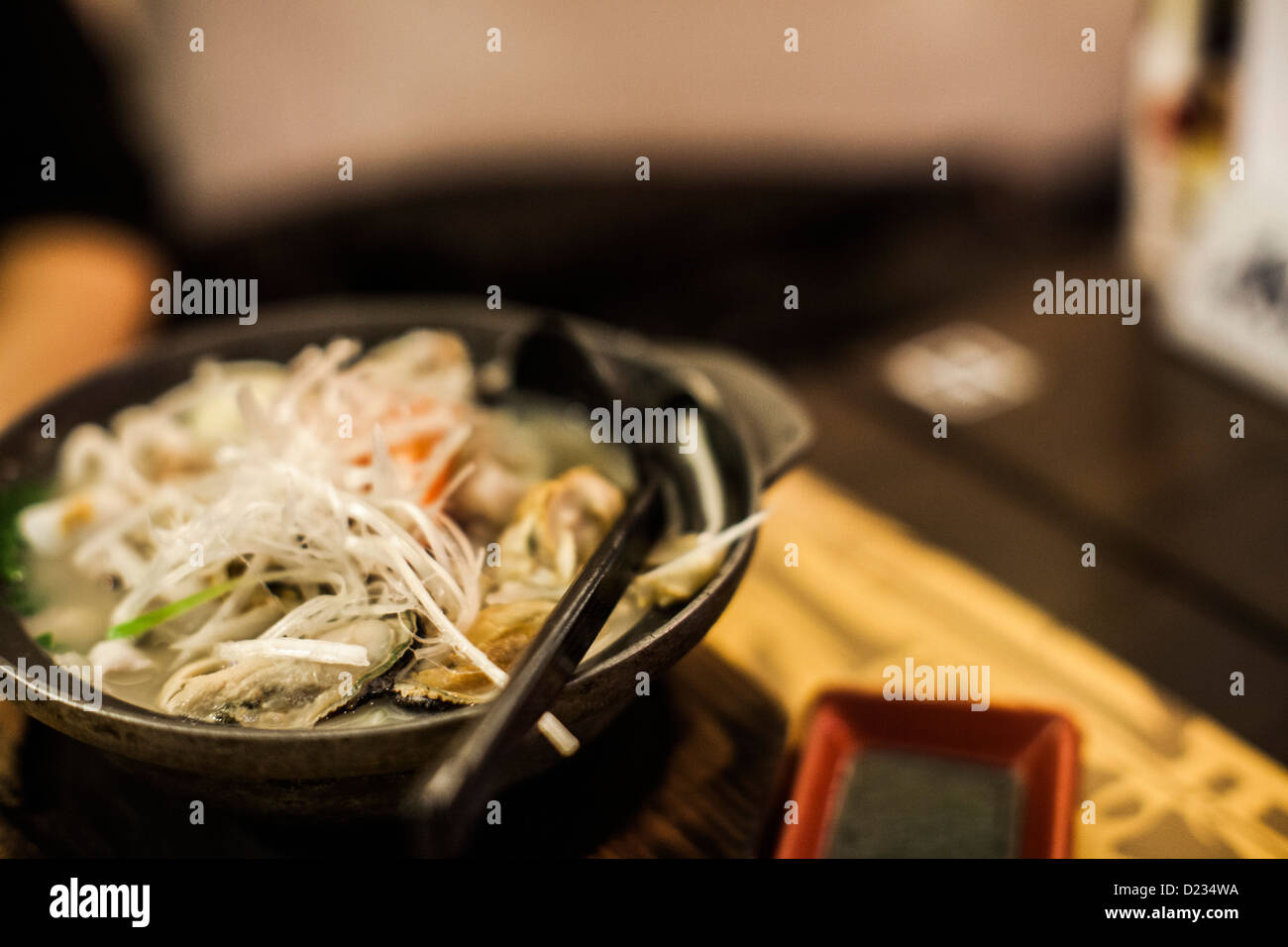Japanese stone pot meals with beef, noodles and vegetables in a healthy ...