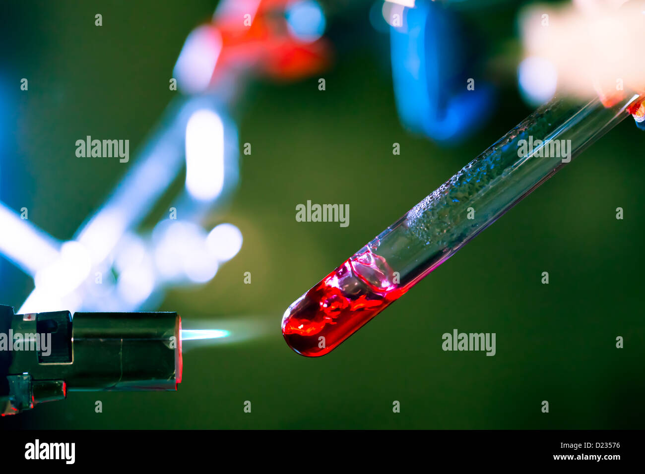 Burner heats the glass test tube Stock Photo - Alamy