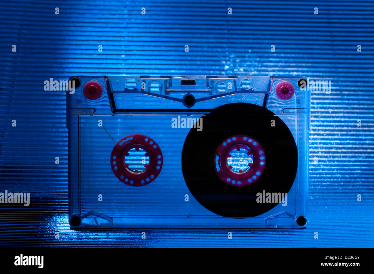 Transparent Cassette tape. Blue color background Stock Photo - Alamy