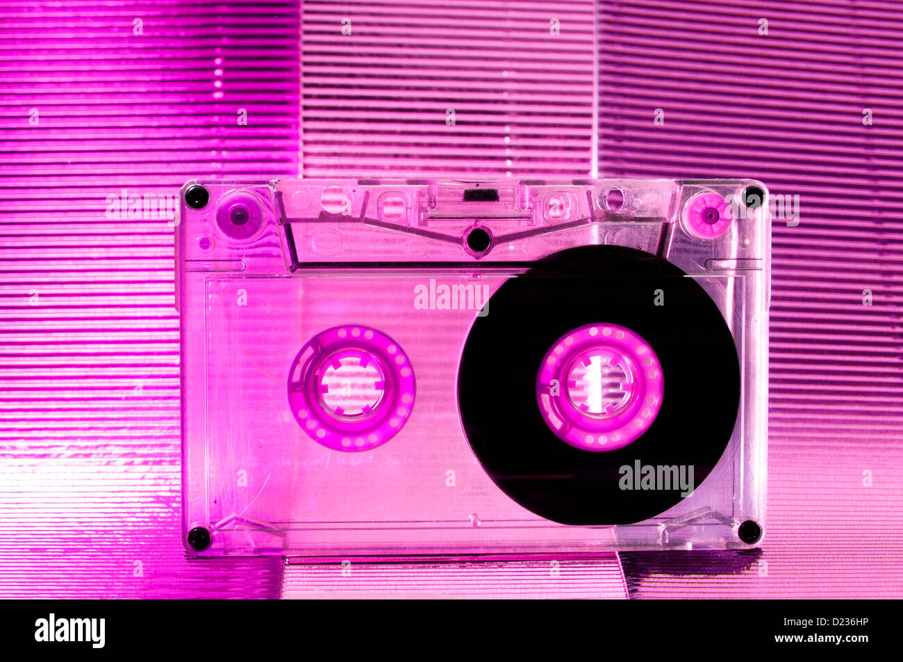 Transparent Cassette tape. Pink and blue background Stock Photo - Alamy