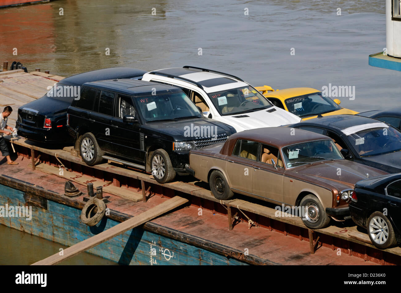 Classic cars on a Chinese freighter at Chiang Saen,Thailand Stock Photo ...