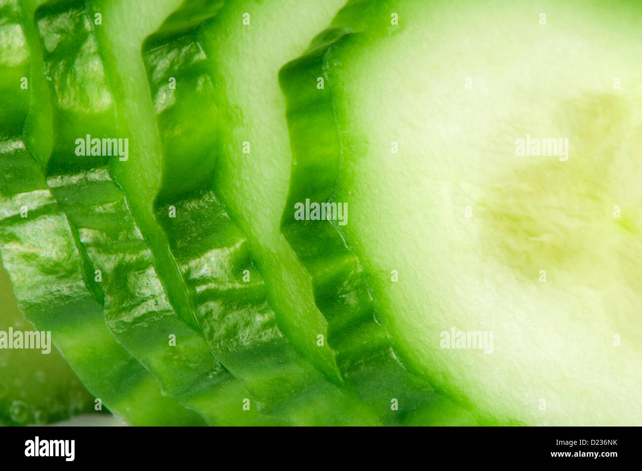 Sliced cucumber close up background Stock Photo - Alamy