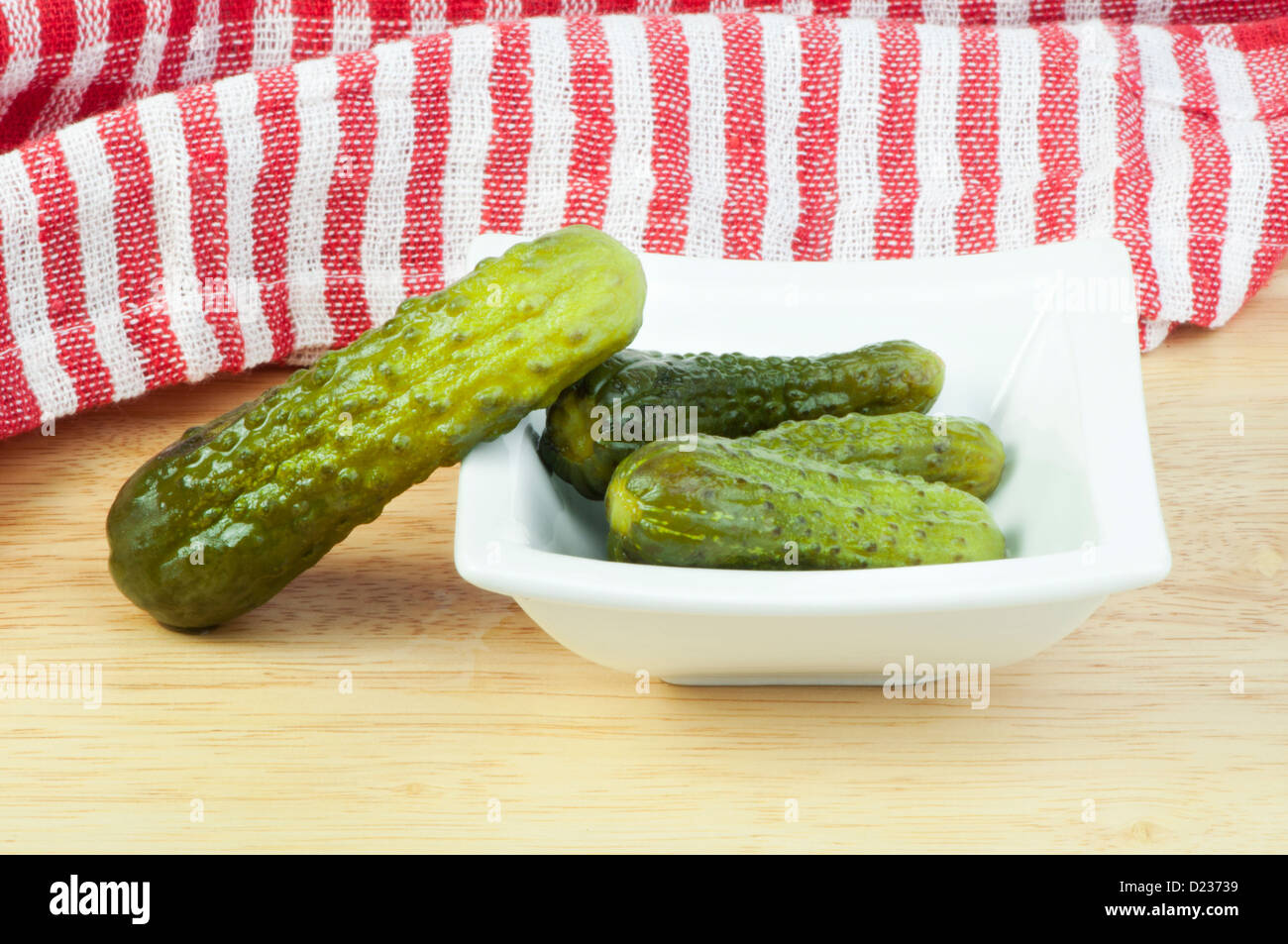 Pickles on kitchen board Stock Photo - Alamy