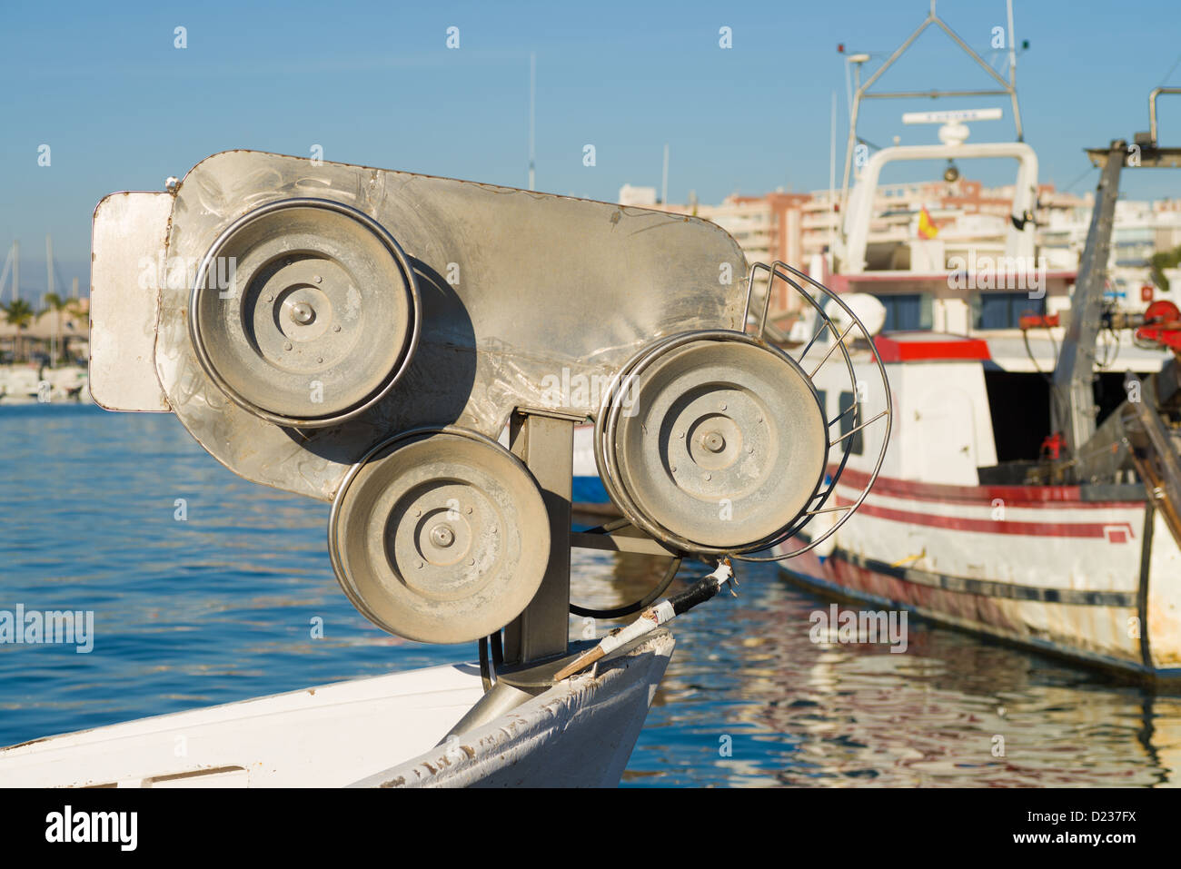 Winch system to retrieve nets on a traditional trawler Stock Photo - Alamy