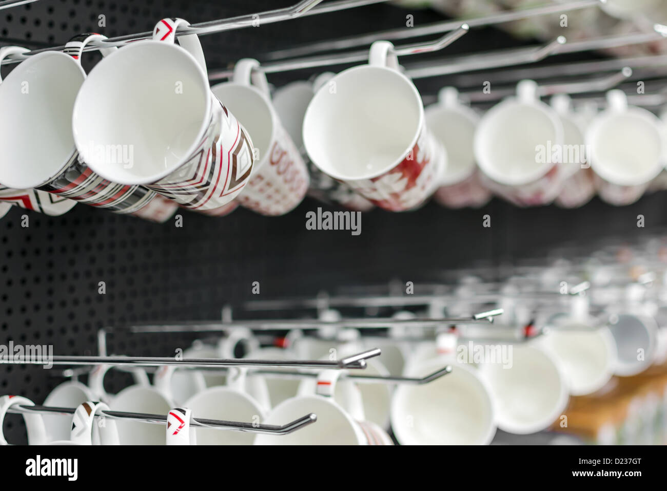 Many coffee mugs in a line Stock Photo - Alamy