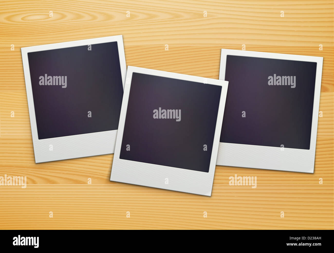 three blank retro polaroid photo frames over wooden background Stock ...