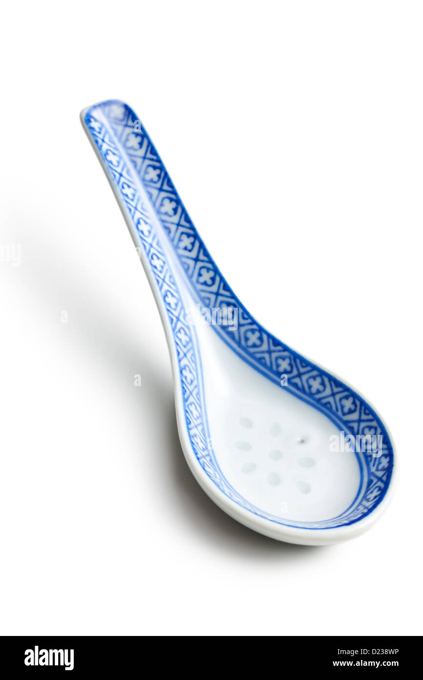 Chinese ceramic spoon on white background Stock Photo - Alamy