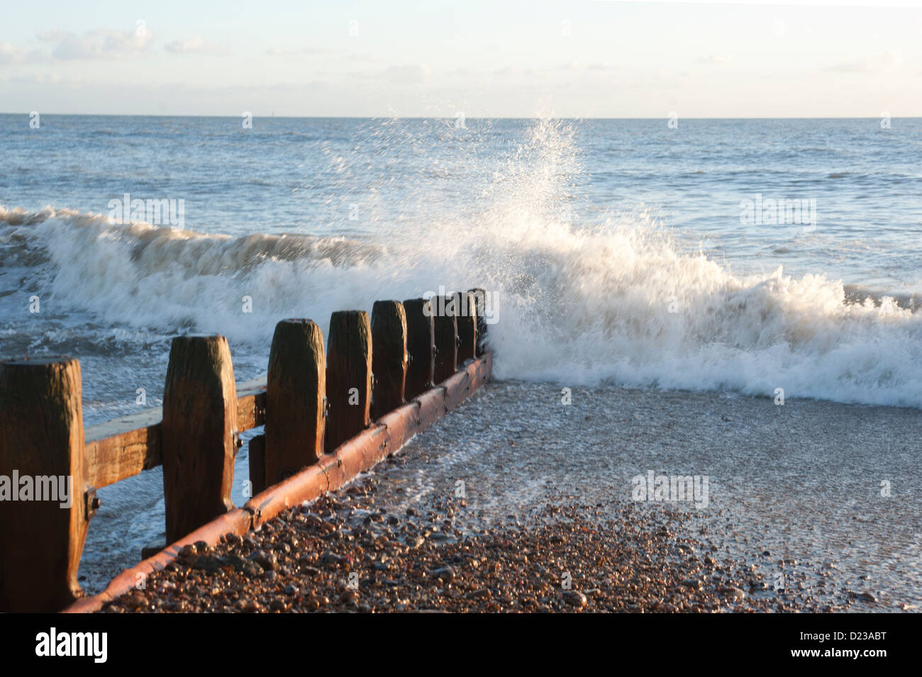 Wooden groynes on a beach in Rustington, West Sussex, UK Stock Photo ...