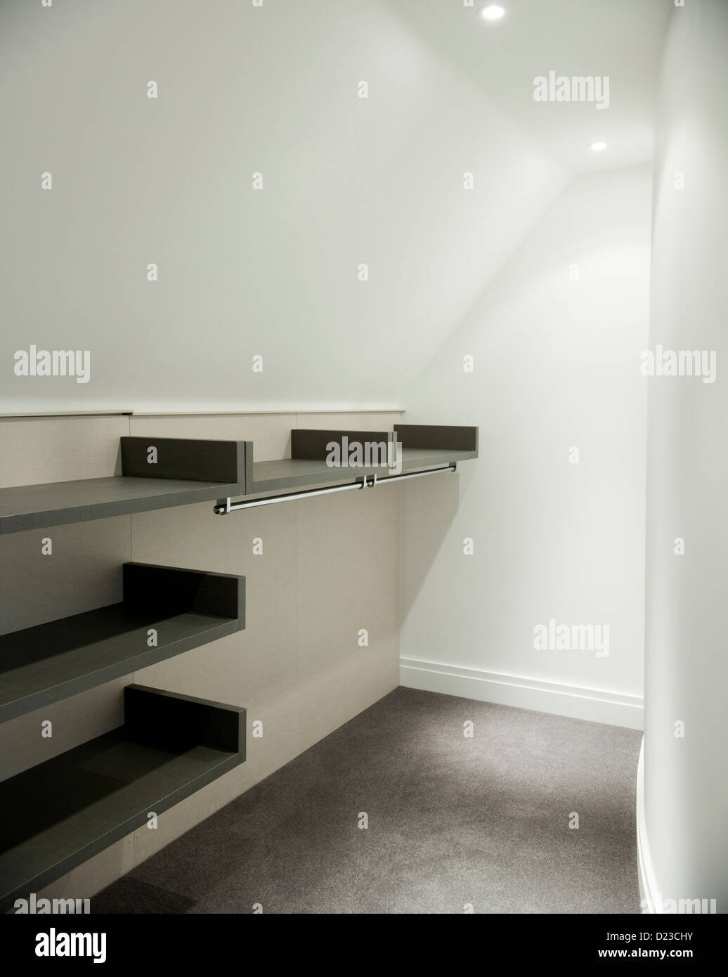 A walk-in dressing room in a newly decorated house Stock Photo - Alamy