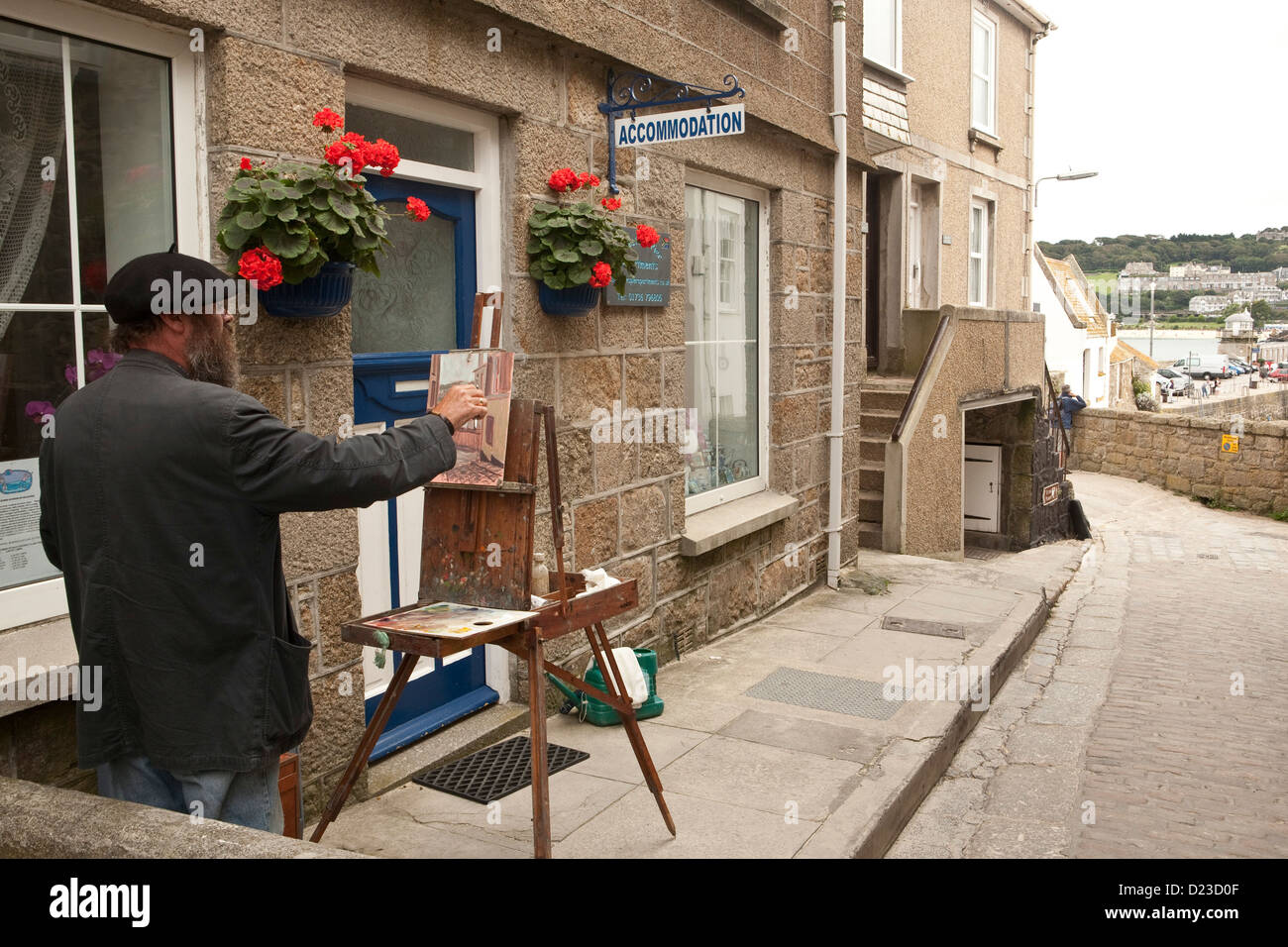 Street artist at work in St Ives, Cornwall Stock Photo - Alamy