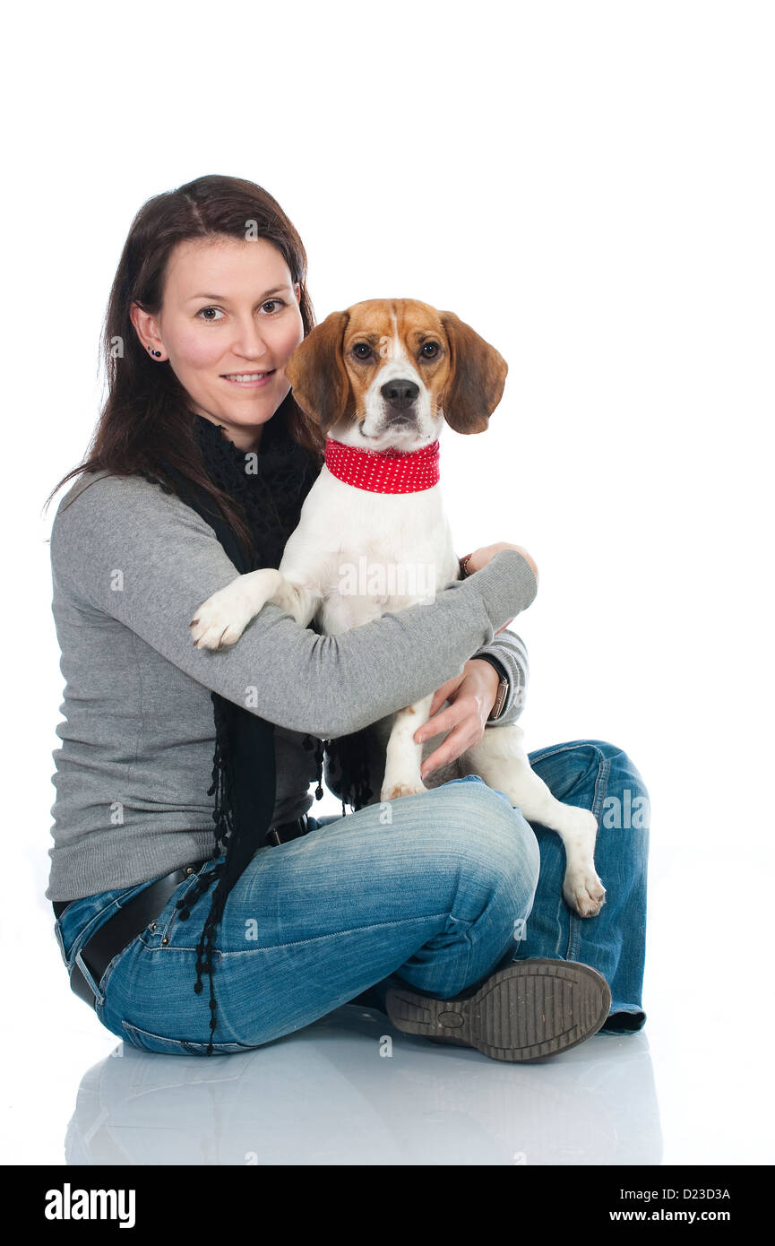 Woman with beagle dog isolated on white Stock Photo - Alamy