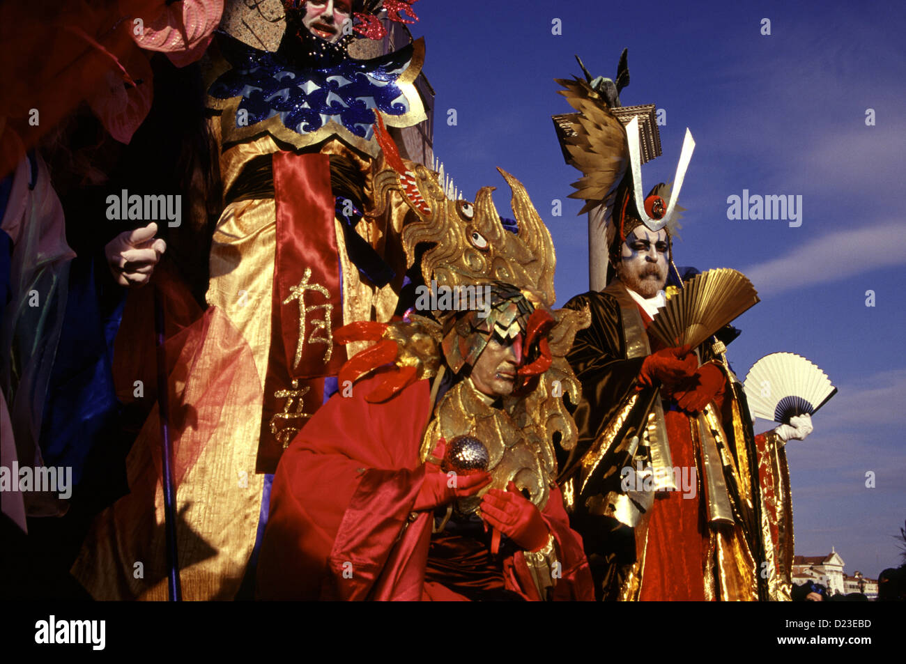 People wearing lavish costumes during the Carnival of Venice Carnevale ...