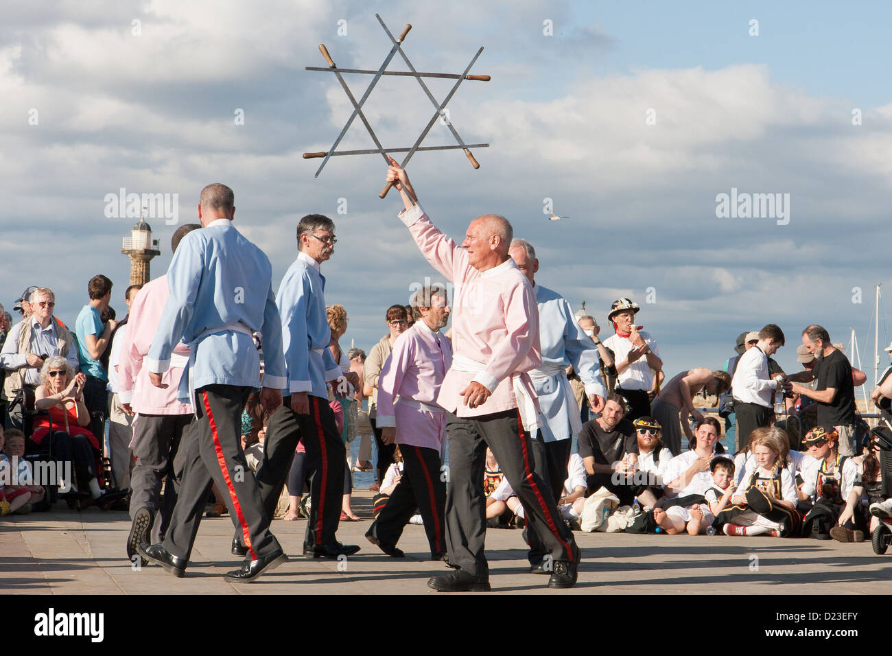 Folk dancing at the Whitby Folk Week 2012 with male rapper dancers ...