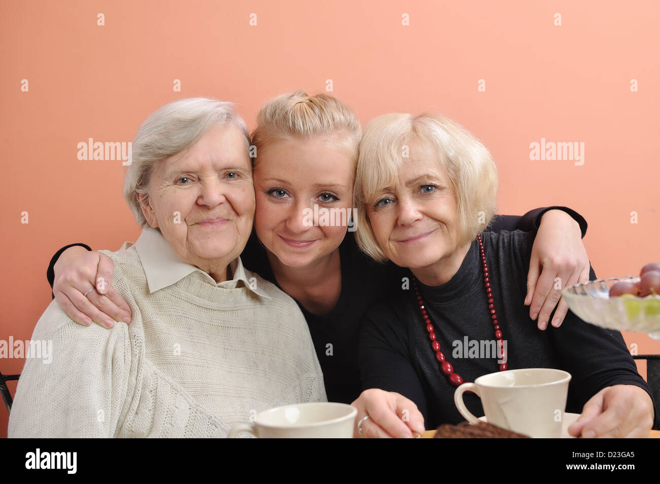 Three woman - three generations on white Stock Photo - Alamy