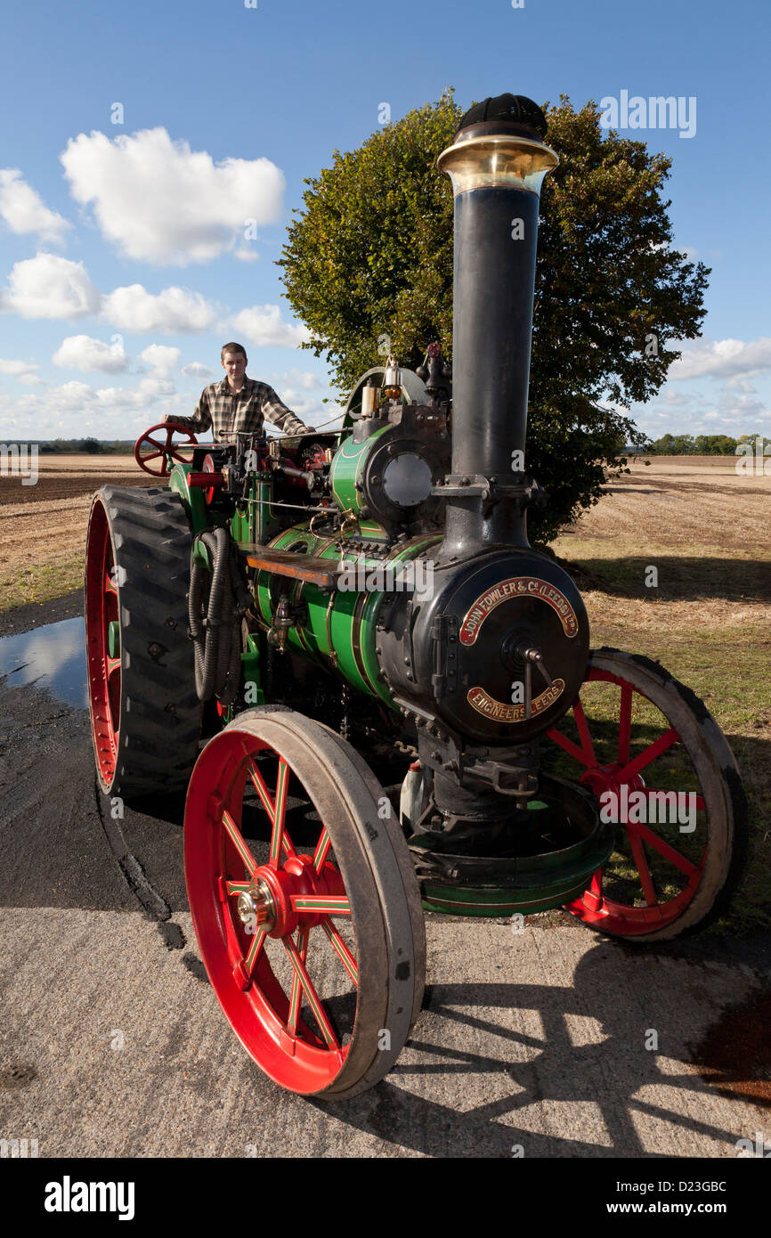 A young man driving a steam engine Stock Photo - Alamy