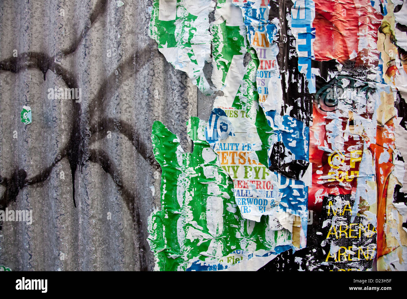 Torn layers of paper fly posters in the urban environment Stock Photo ...