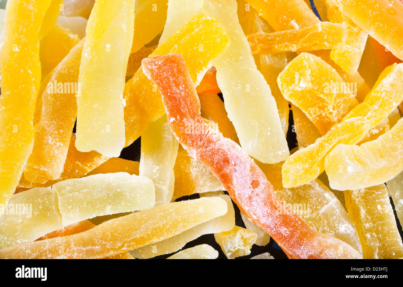 Sweet dried papaya fruit bars background Stock Photo - Alamy