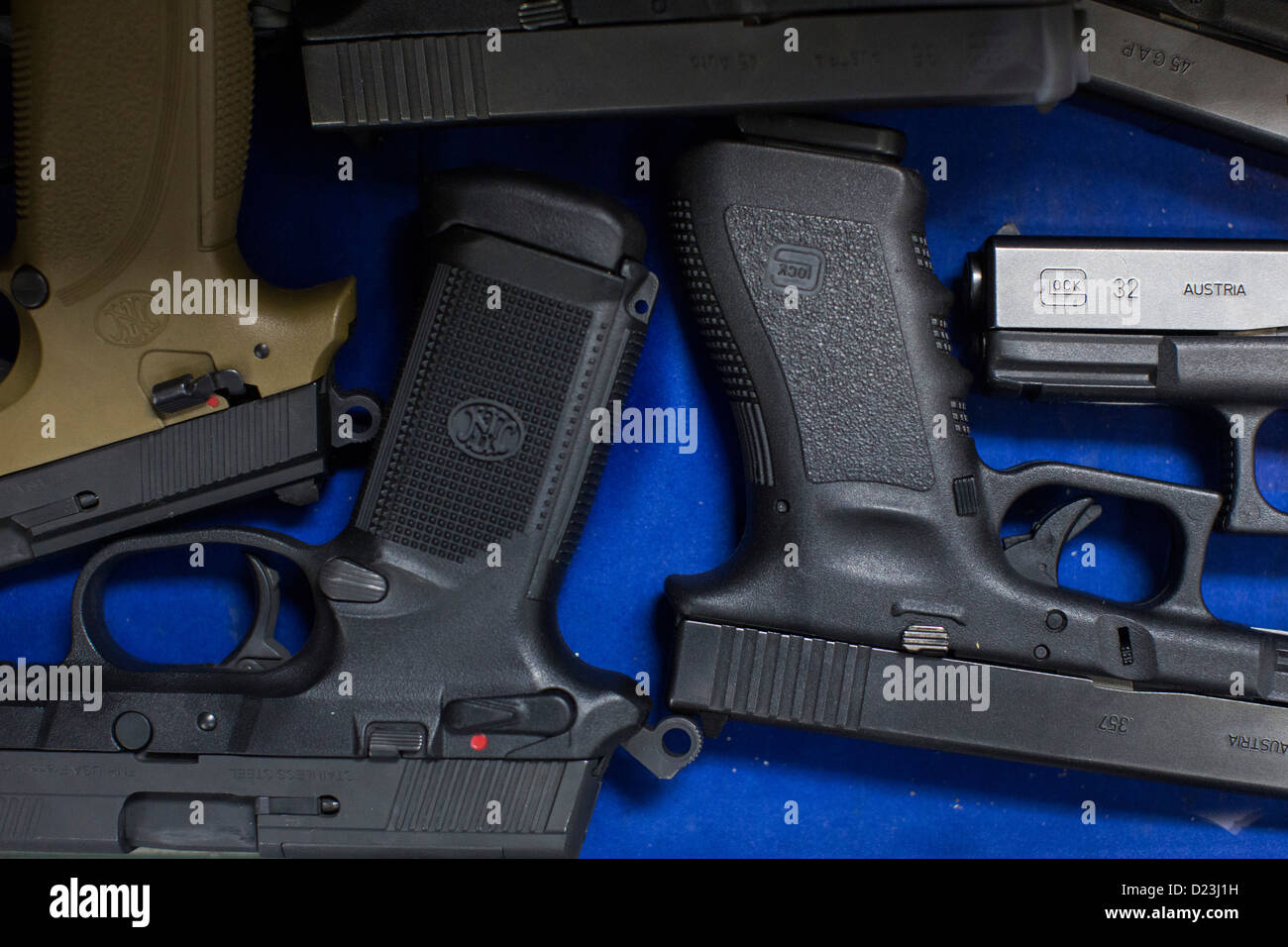 Handguns on display at a gun store Stock Photo - Alamy