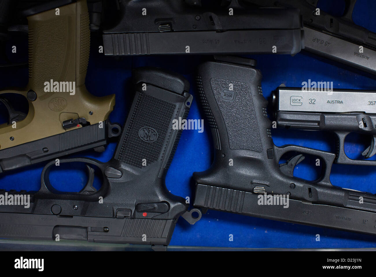Handguns on display at a gun store Stock Photo - Alamy