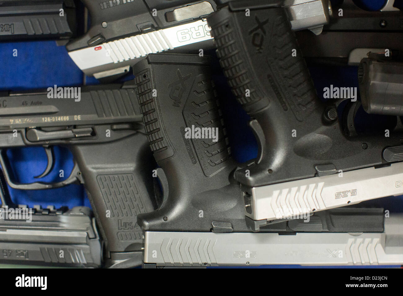 Handguns on display at a gun store Stock Photo - Alamy