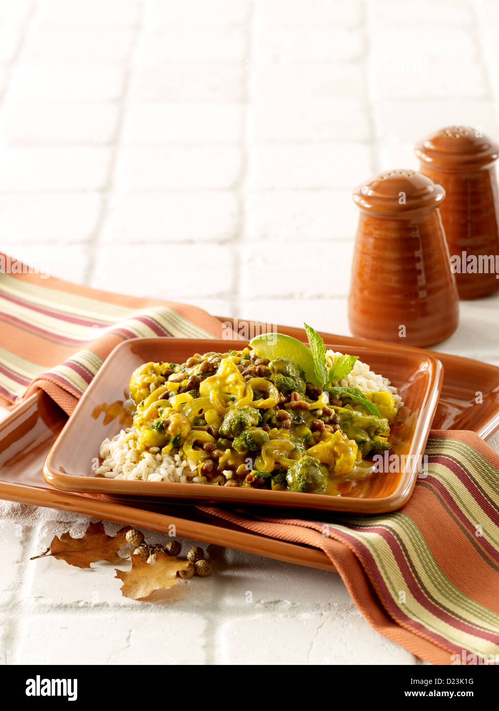 Vegetable curry over white rice Stock Photo - Alamy