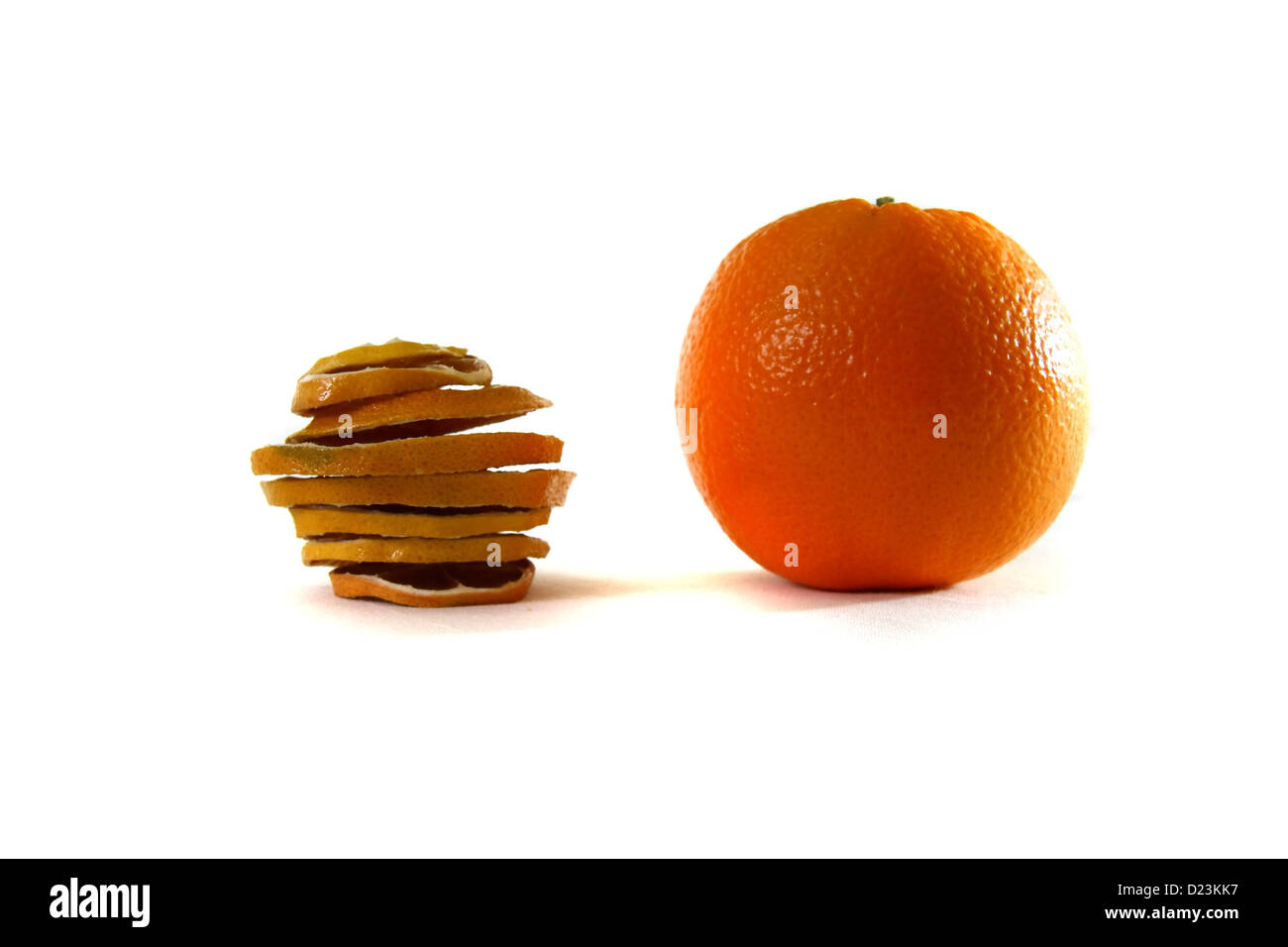 Dried sliced orange and fresh orange together on white background Stock ...