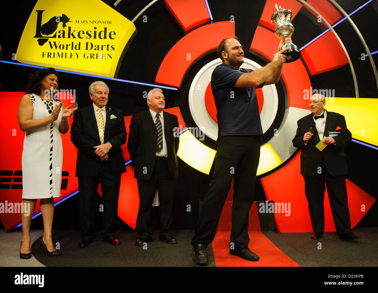 13.01.2013 Frimley Green, England. Scott Waites collects his trophy ...