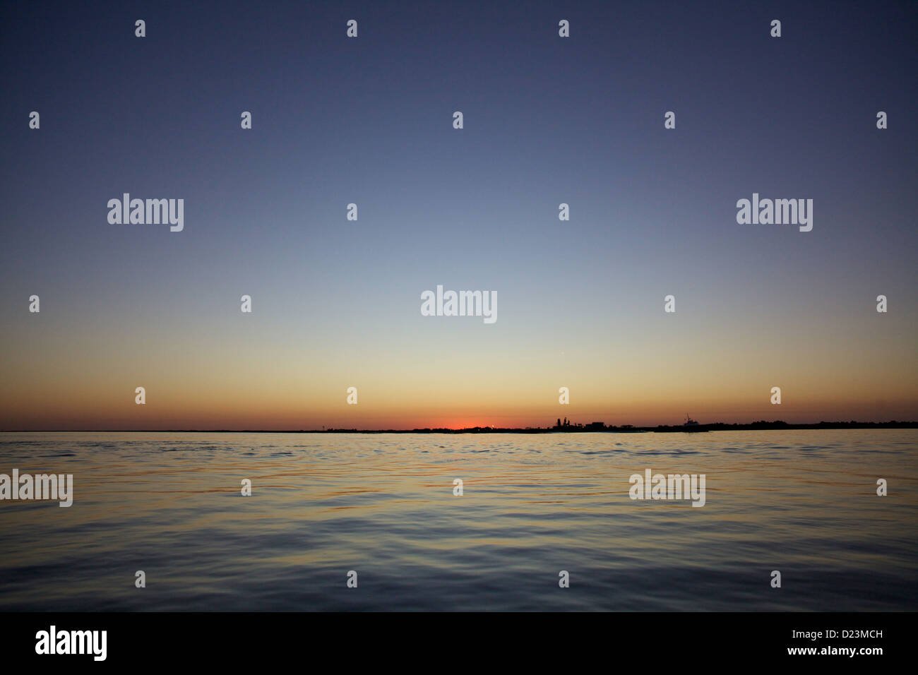 The sunset sets over the Louisiana Delta Stock Photo - Alamy