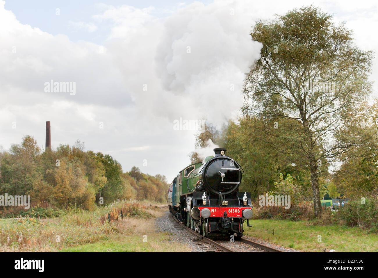 Steam locomotive pulling a passenger train on the East Lancs Railway at ...